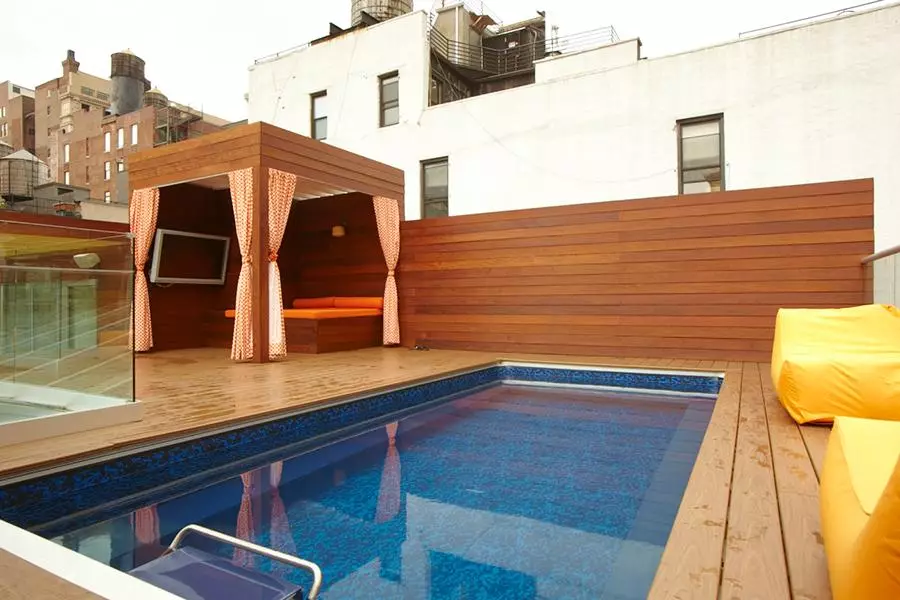17 East 17th Street, appartemint mei swimbad op it dak, driuwende glêzen trap, renovearre histoarysk landmarkgebou