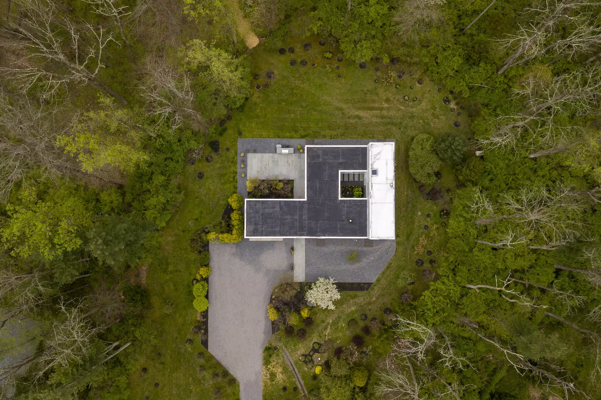 Pisos de concreto e revestimento de metal fazem desta casa de US $ 1,5 milhão em Nova Jersey o sonho de um amante modernista 85_3